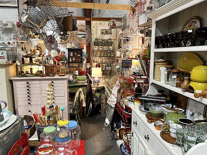 Kitchen treasures stacked from floor to ceiling. One person's forgotten gadget is another's culinary conversation piece.