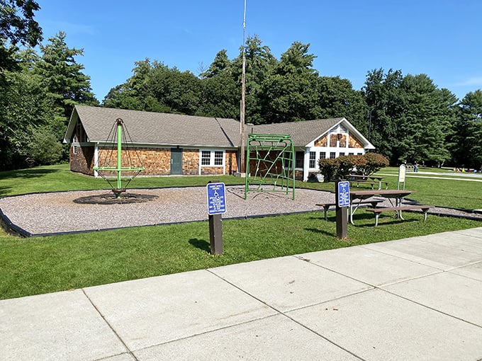 The visitor center stands ready like a friendly neighbor, offering maps and wisdom for your woodland wanderings.
