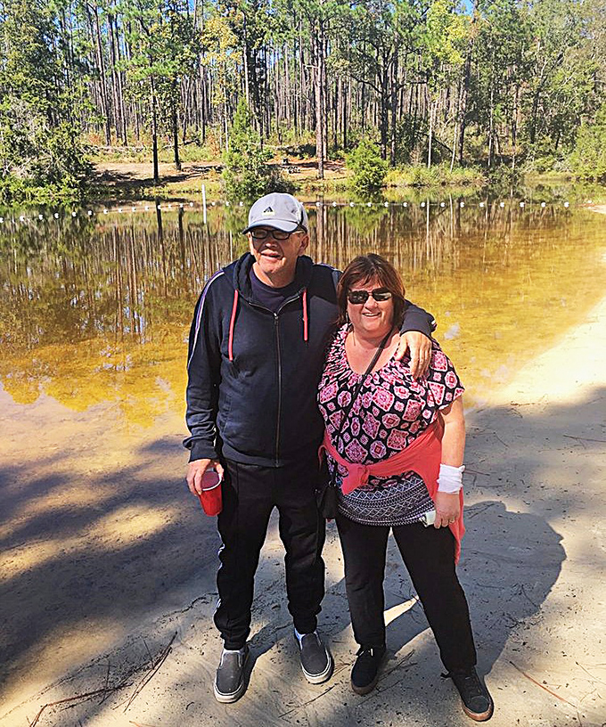 The park's serene lake offers a perfect mirror for the towering pines, creating nature's own Instagram filter without needing a single hashtag.