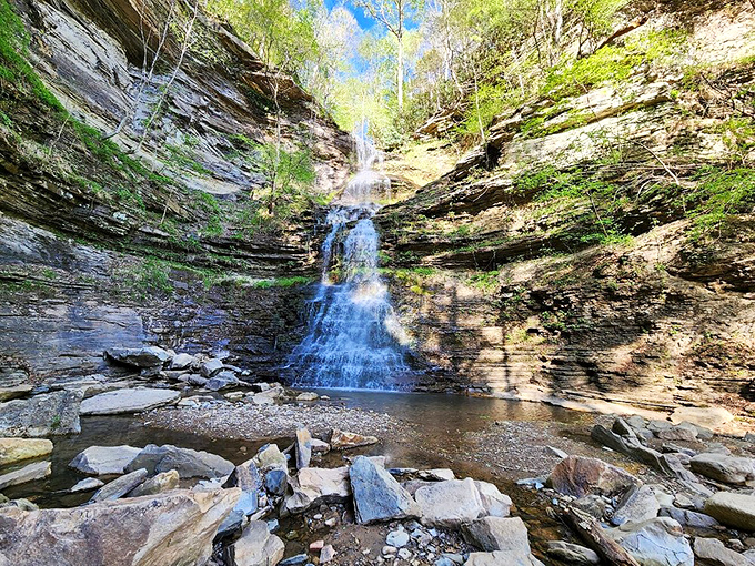 Sunlight plays across the amphitheater of stone while water dances down multiple tiers. Mother Nature's version of a Broadway spectacular, no tickets required.