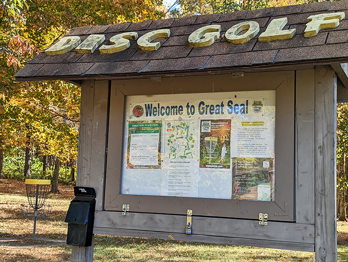 This disc golf course sign might as well say "Warning: May cause extreme enjoyment and competitive family feuds."
