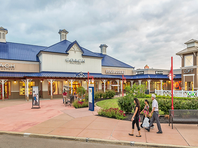 Blue roofs and welcoming walkways create the illusion you're strolling through a charming village rather than Ohio's bargain-hunting headquarters.