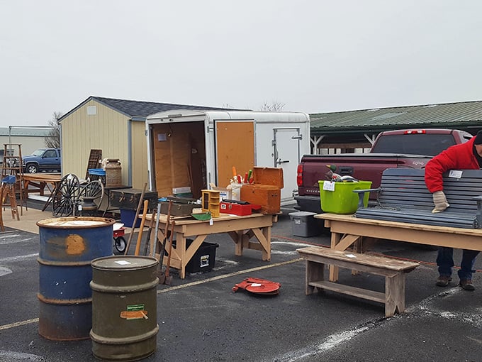 The treasure hunter's playground: wooden benches, metal barrels, and the promise of finding that perfect something hiding in plain sight.