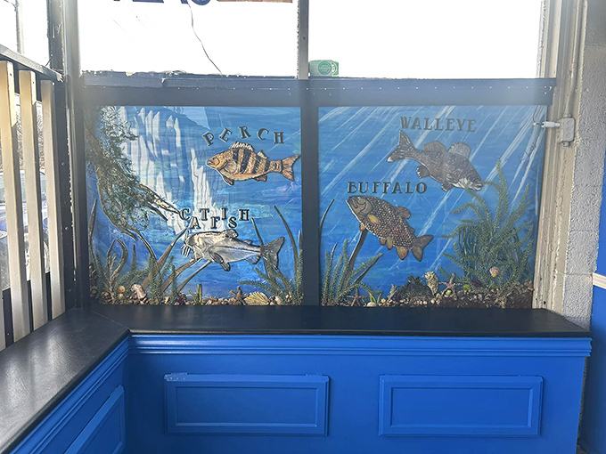 These illustrated fish windows aren't just decoration—they're a preview of coming attractions. Like an aquatic movie poster for your stomach.