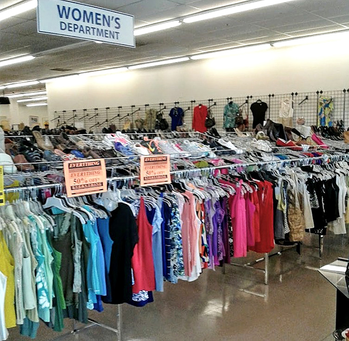 Rainbow-organized racks stretch endlessly, proving that one person's "I'll never wear this again" becomes another's fashion triumph.