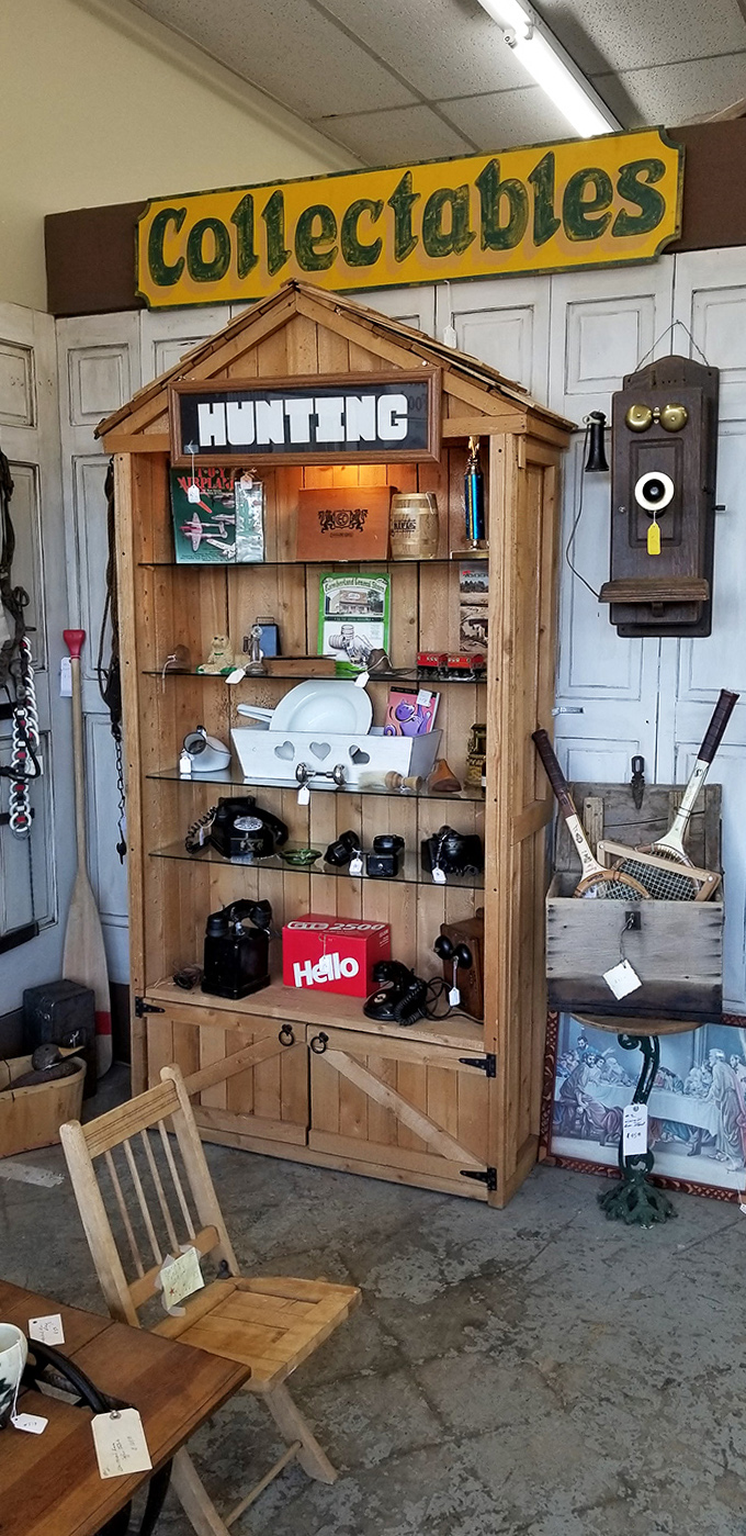 A hunting collectibles cabinet that's more organized than most people's kitchen pantries, and probably worth more too.