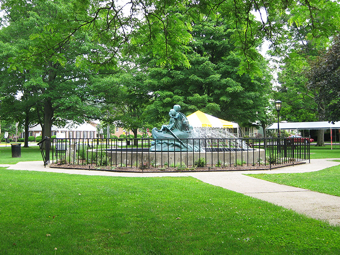 The Green's iconic fountain creates Wellsboro's living room, where locals gather and visitors inevitably stop to snap that perfect Pennsylvania postcard moment.