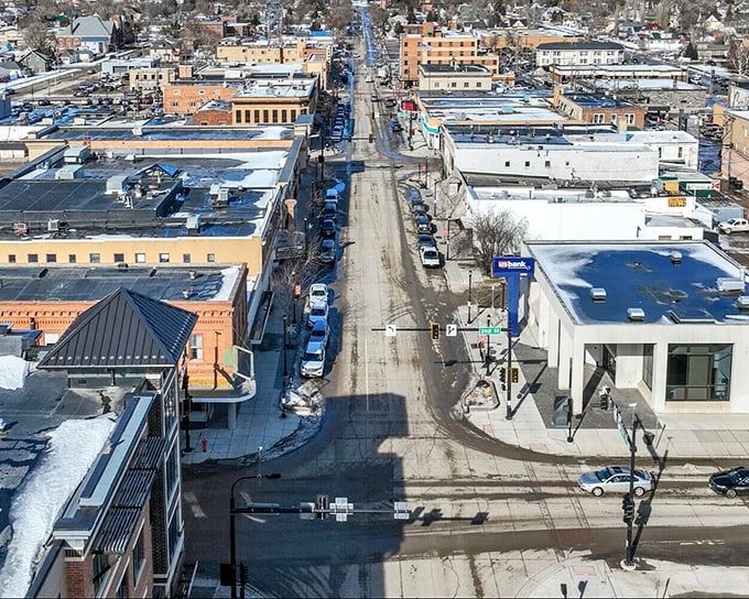 Winter in Williston reveals the town's orderly grid from above &ndash; a snow-dusted chessboard where every building plays a strategic role in community life.