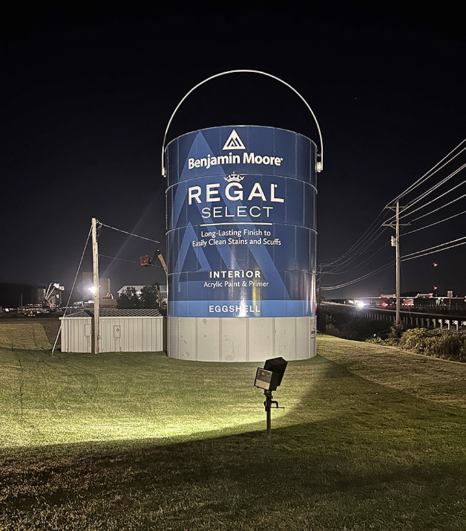 Night falls, but the paint can shines on. Illuminated against the darkness, it's Shippensburg's own lighthouse for lost decorators.