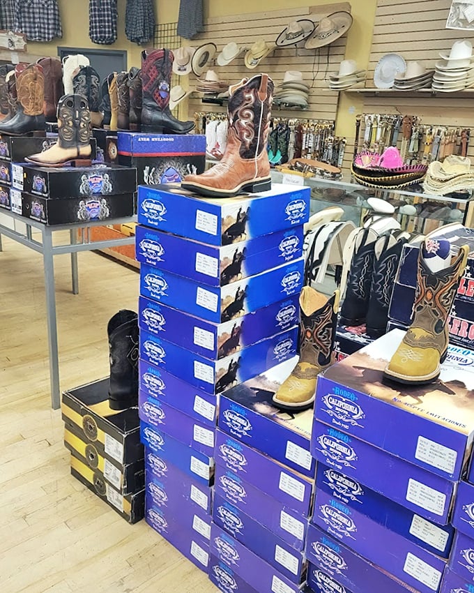 Boot heaven exists, and it's stacked sky-high in blue boxes. These aren't just footwear—they're wearable art with stories stitched into every leather panel.