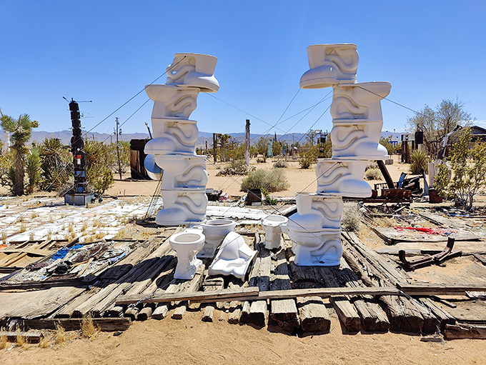 Porcelain thrones reaching skyward like ancient monuments. Who knew bathroom fixtures could make such a profound statement about our throwaway culture?