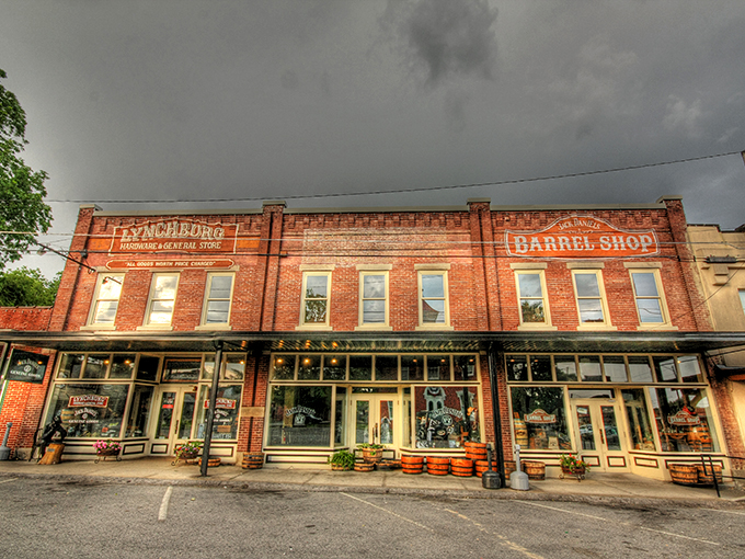 Historic brick buildings under a dramatic sky in Lynchburg. Soak in the classic charm of this quaint Tennessee town.