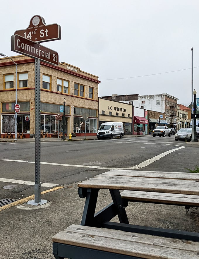 The intersection of 14th and Commercial marks the heart of Astoria's shopping district, where time seems to slow down for browsing and people-watching.