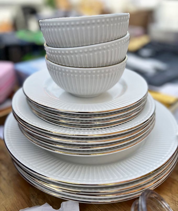 Elegant simplicity meets bargain hunting. These pristine porcelain dishes with gold trim could transform your dinner table without emptying your wallet.