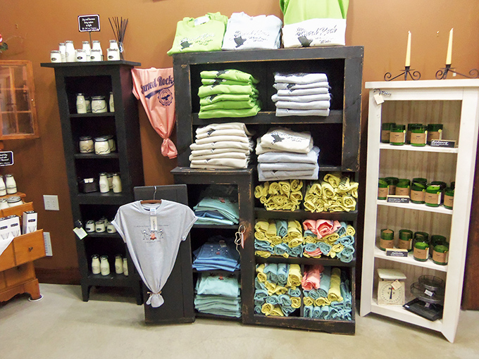 Not your average t-shirt display! These color-coordinated linens and apparel are arranged with the kind of care usually reserved for museum exhibits.