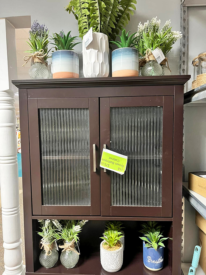 Not your grandmother's curio cabinet&mdash;though she'd love it! This handsome wood and glass piece practically begs to display your most cherished knick-knacks. 