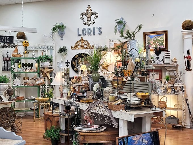 Lori's booth showcases the art of beautiful chaos – where French country meets California chic in a dance of decorative elements that somehow work perfectly together.