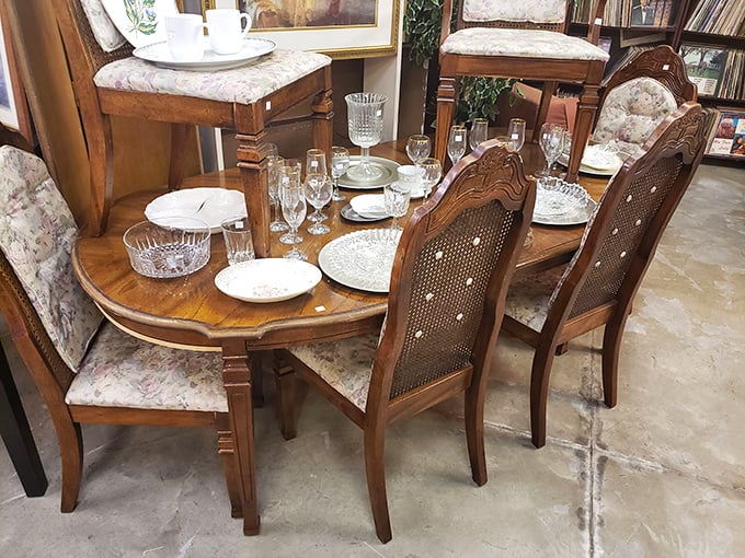 This elegant dining set waits patiently for its next family gathering. Imagine the stories it could tell about holiday meals and late-night conversations.