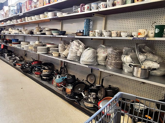 Kitchen heaven awaits! Rows of forgotten dinnerware and cookware stand ready for their second act in Pittsburgh homes, like Broadway understudies finally getting their shot.