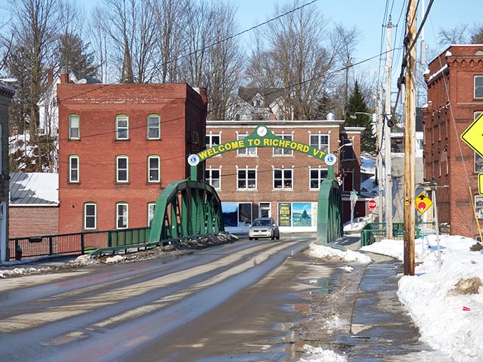 The iconic green "Welcome to Richford" bridge spans the Missisquoi River, a gateway to small-town serenity that feels increasingly rare.