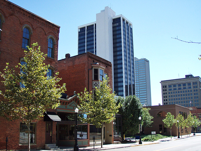 The juxtaposition of historic brick buildings against modern skyscrapers creates Fort Wayne's unique skyline &ndash; a visual timeline of the city's evolution.