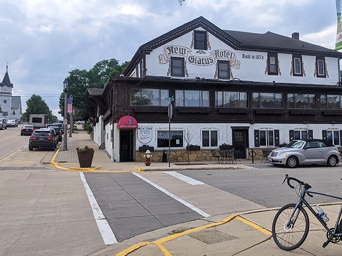 The historic New Glarus Hotel stands as a testament to Swiss heritage, where traditional hospitality meets small-town charm in America's Little Switzerland.