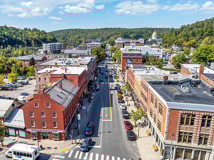 The view down State Street offers a perfect snapshot of Vermont living – historic buildings nestled against green mountains, no skyscrapers required.
