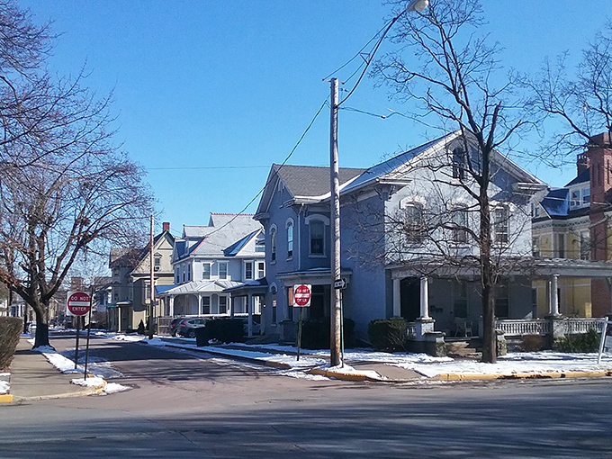 These picturesque residential streets showcase affordable homes where neighbors still wave and porch sitting remains an honored tradition.