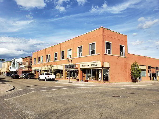 These coral-colored storefronts have watched generations pass by, standing proudly like the town's well-dressed elders at Sunday service.