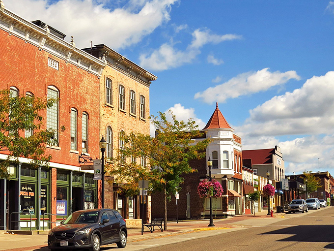 Historic buildings stand shoulder-to-shoulder like old friends sharing stories that span centuries, not just happy hours.