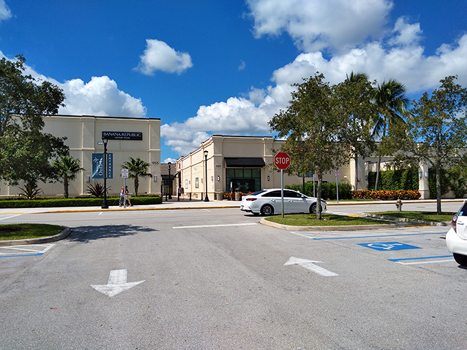 Blue skies and designer deals await as you approach this shopping sanctuary, where your wallet gets a vacation but your style gets an upgrade.