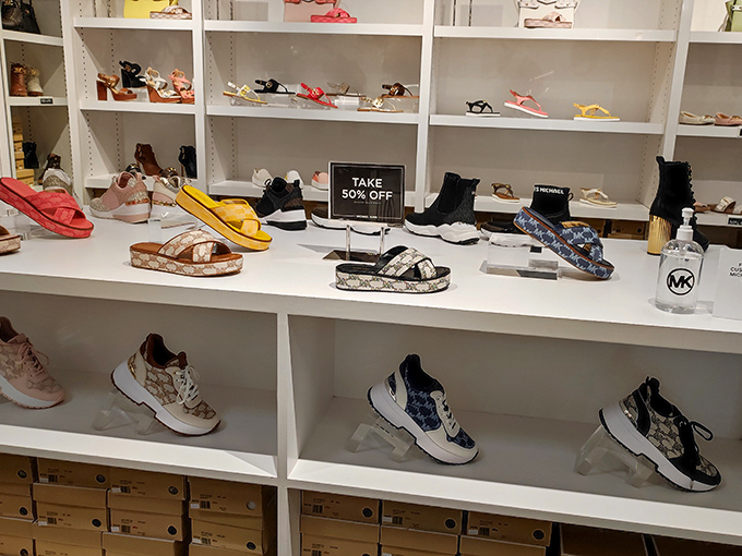 The universal language of "50% OFF" speaks to my soul. These shelves of footwear whisper sweet nothings to feet tired of paying full price.