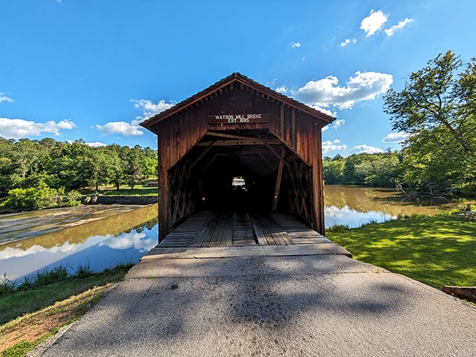 Standing at the entrance feels like peering into a time tunnel. The bridge beckons with promises of stories from generations past.