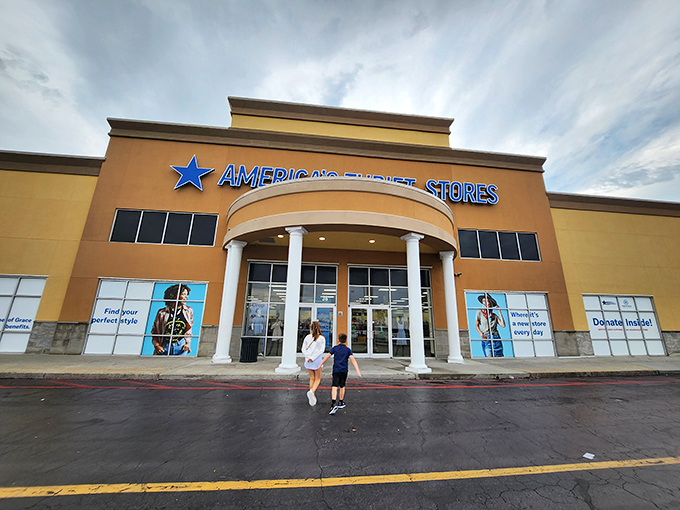 Two shoppers approach the columned entrance, unaware they're about to embark on a treasure hunt that rivals any antique roadshow.