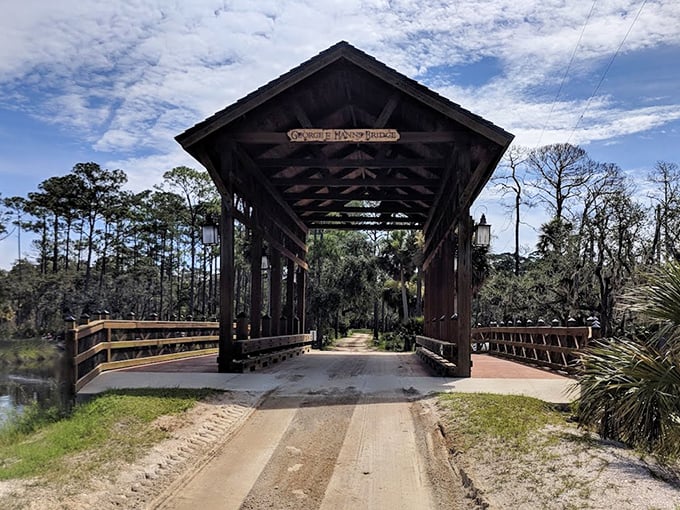 Rustic wooden beams frame the sky beyond, creating a portal that feels like stepping into a New England postcard&mdash;right here in Florida.