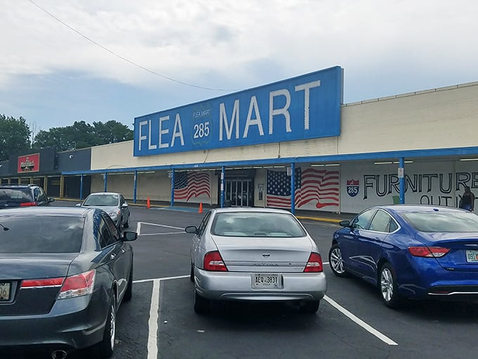 The iconic blue signage stands like a beacon for bargain hunters, American flags proudly announcing: "Yes, we've got treasures inside. Come and find yours."