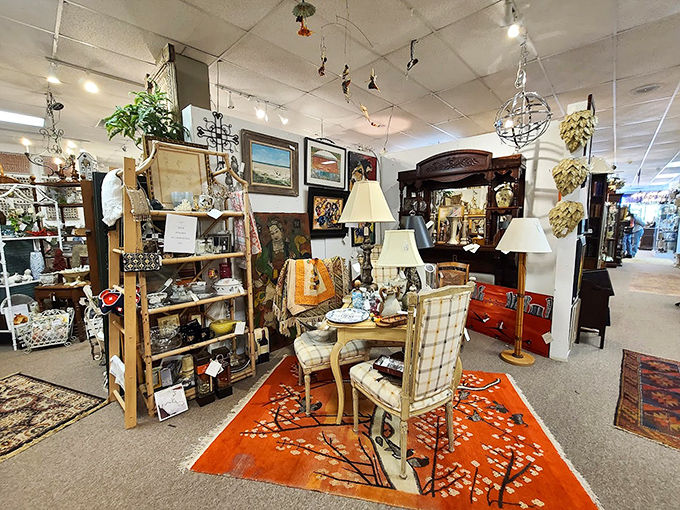 Mid-century meets Victorian in this stylish vignette. That orange area rug isn't just a statement&mdash;it's starting a whole conversation.