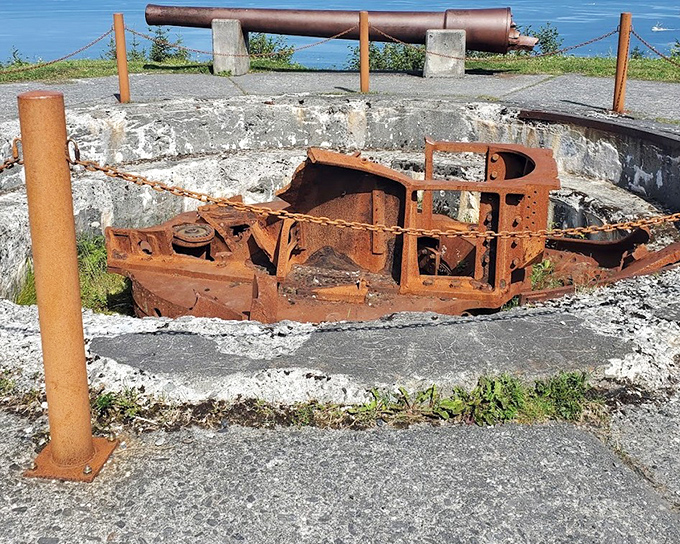 History rusting beautifully: This WWII gun emplacement tells silent stories of Kodiak's strategic importance, now serving as an unlikely sculpture against the Pacific backdrop.