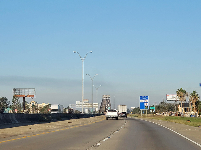 The I-10 bridge welcomes you to Westlake – where traffic jams are measured in seconds, not hours. City proximity without city headaches.