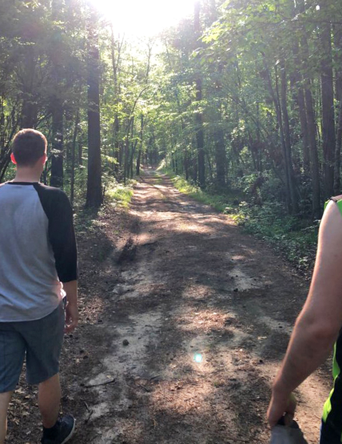 Sometimes the best adventures start with two people and a sun-dappled trail that whispers "this way to wonder."