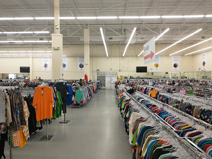 Rainbow rows of clothing stretch toward the horizon, organized with military precision that would make Marie Kondo weep with joy.