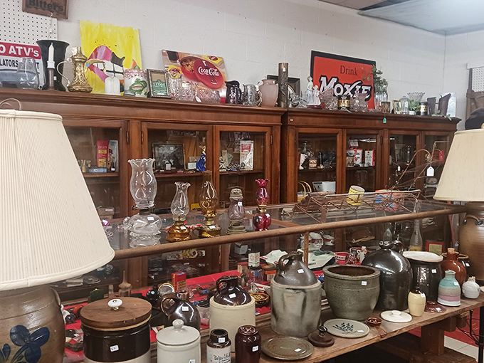 Glass cabinets brimming with yesterday's treasures create a museum-like display where every shelf tells a different American story.