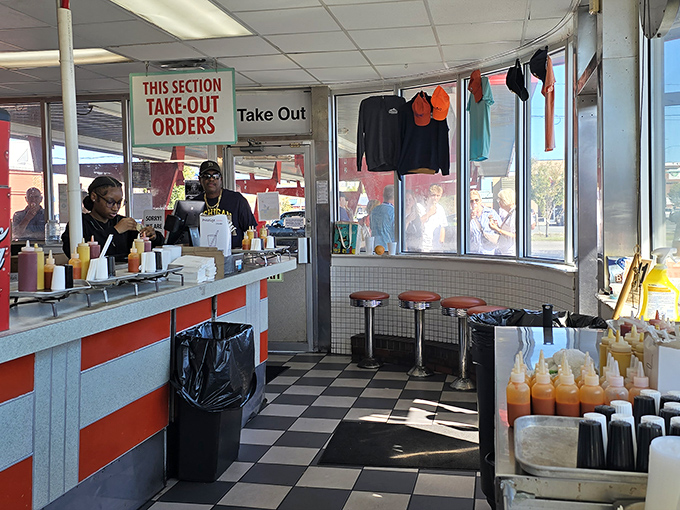 Step up to the take-out counter where Norfolk history is served daily alongside burgers and shakes by staff who've perfected the art of diner efficiency.