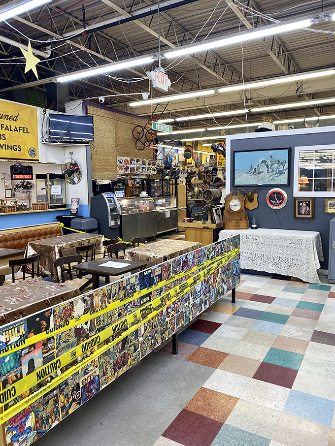 Inside, the sensory overload begins&mdash;colorful stalls, caution-tape-wrapped counters, and the unmistakable buzz of commerce that's been humming for decades.