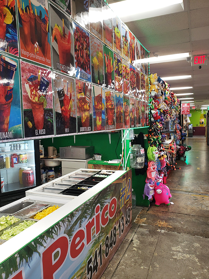 A kaleidoscope of colorful drink options and playful toys line this vendor's stall &ndash; proof that shopping and hydration can happily coexist.