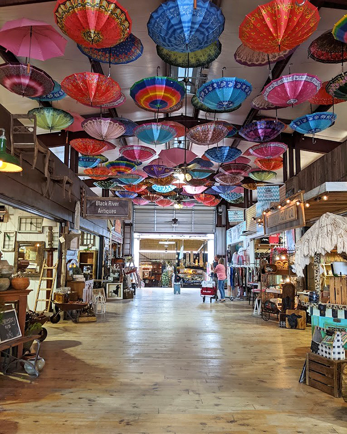 A kaleidoscope of colorful umbrellas transforms this shopping corridor into an Instagram paradise. Mary Poppins would approve of this whimsical ceiling.