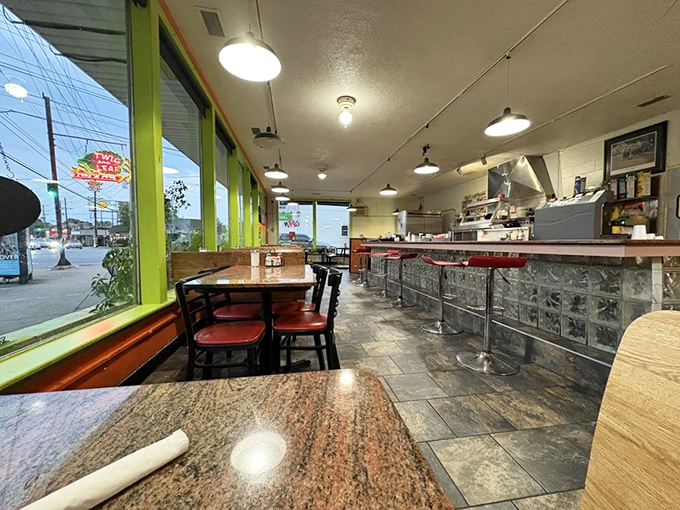 Inside, the glass block counter and red stools invite you to pull up a seat where countless Louisville locals have parked themselves for breakfast since the mid-century.