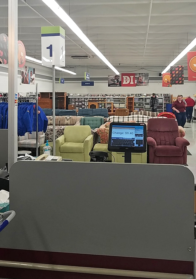 The furniture section: where recliners of every era congregate like a support group for comfortable seating that's ready for its second act.
