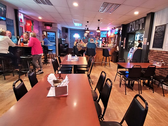 The heart of small-town Iowa socializing &ndash; where TVs broadcast the game, but the real entertainment is the community gathered around those wooden tables.