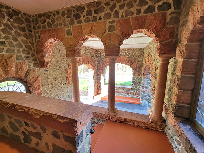 Step inside and discover the castle's stunning stone archways. The craftsmanship here makes modern open-concept homes look like they're not even trying.